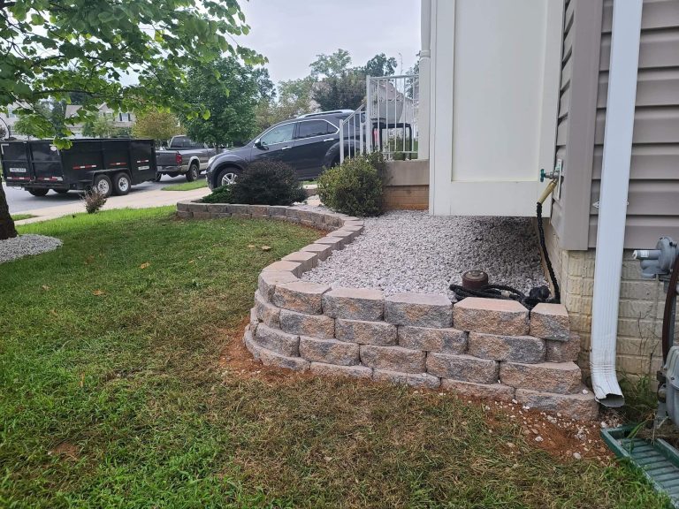 How to hide a generator with landscaping?